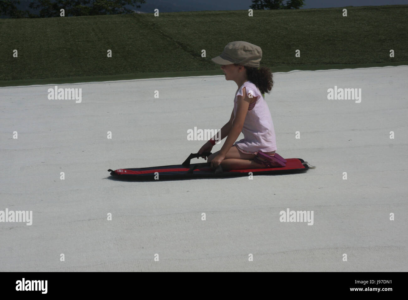 Sliding down snow slope hi-res stock photography and images - Alamy
