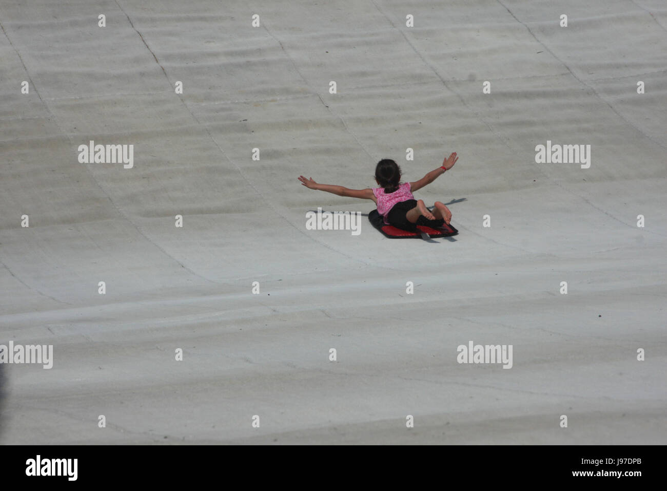 Sliding down slope hi-res stock photography and images - Alamy