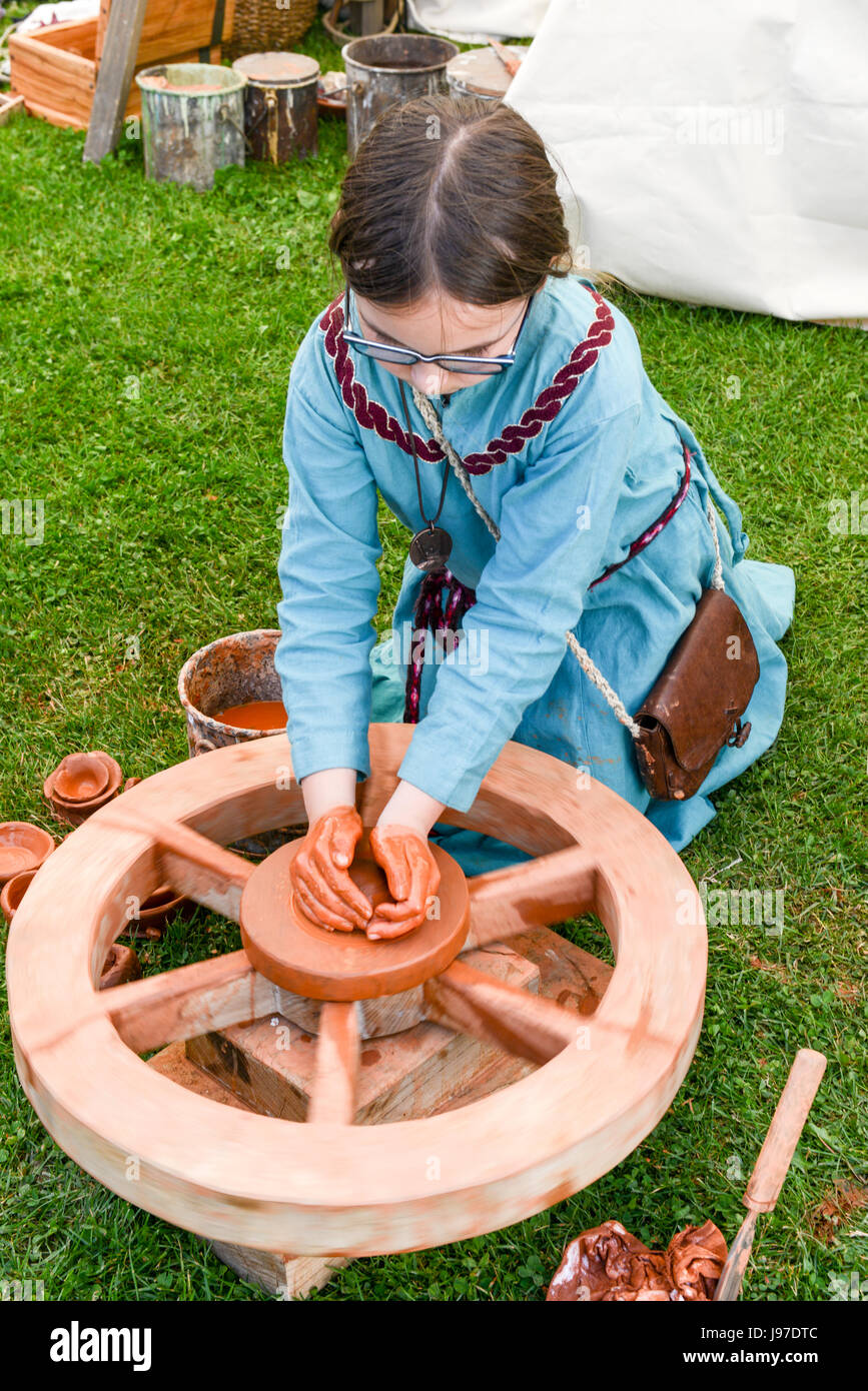 Bellinzona, Switzerland - 21 May 2017: girl making pottery on a ...
