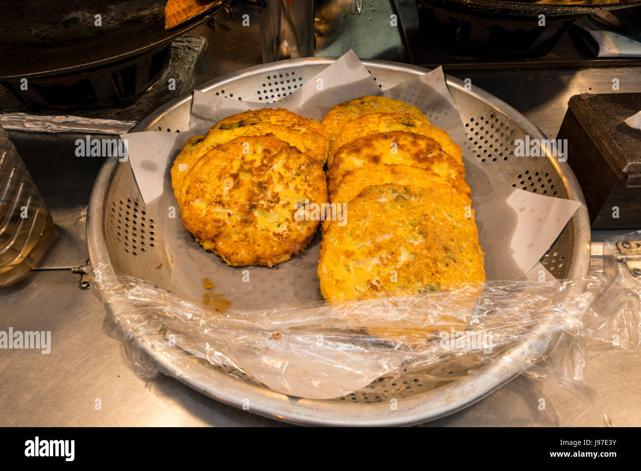 Korean dish. Various ingredients coated in wheat flour and egg, then ...