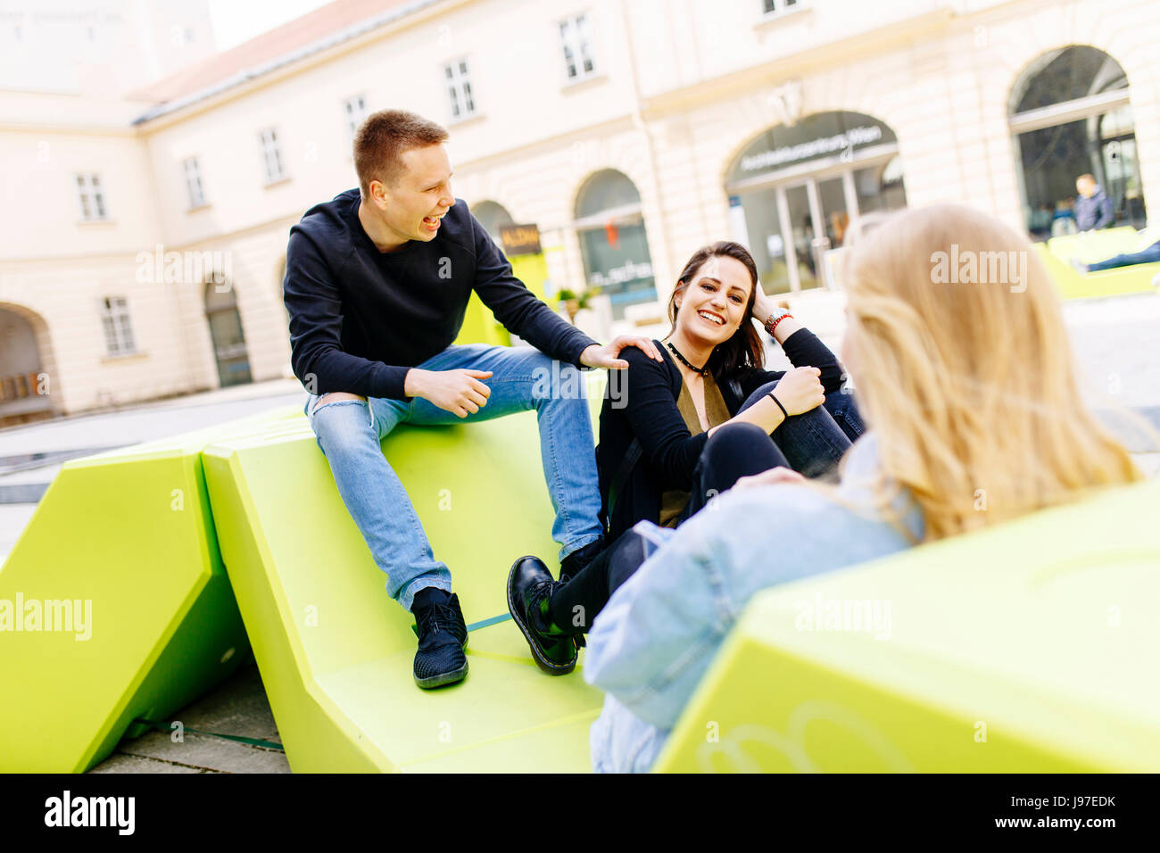 Young people sitting on the lounge seats in Vienna, Austria Stock Photo ...