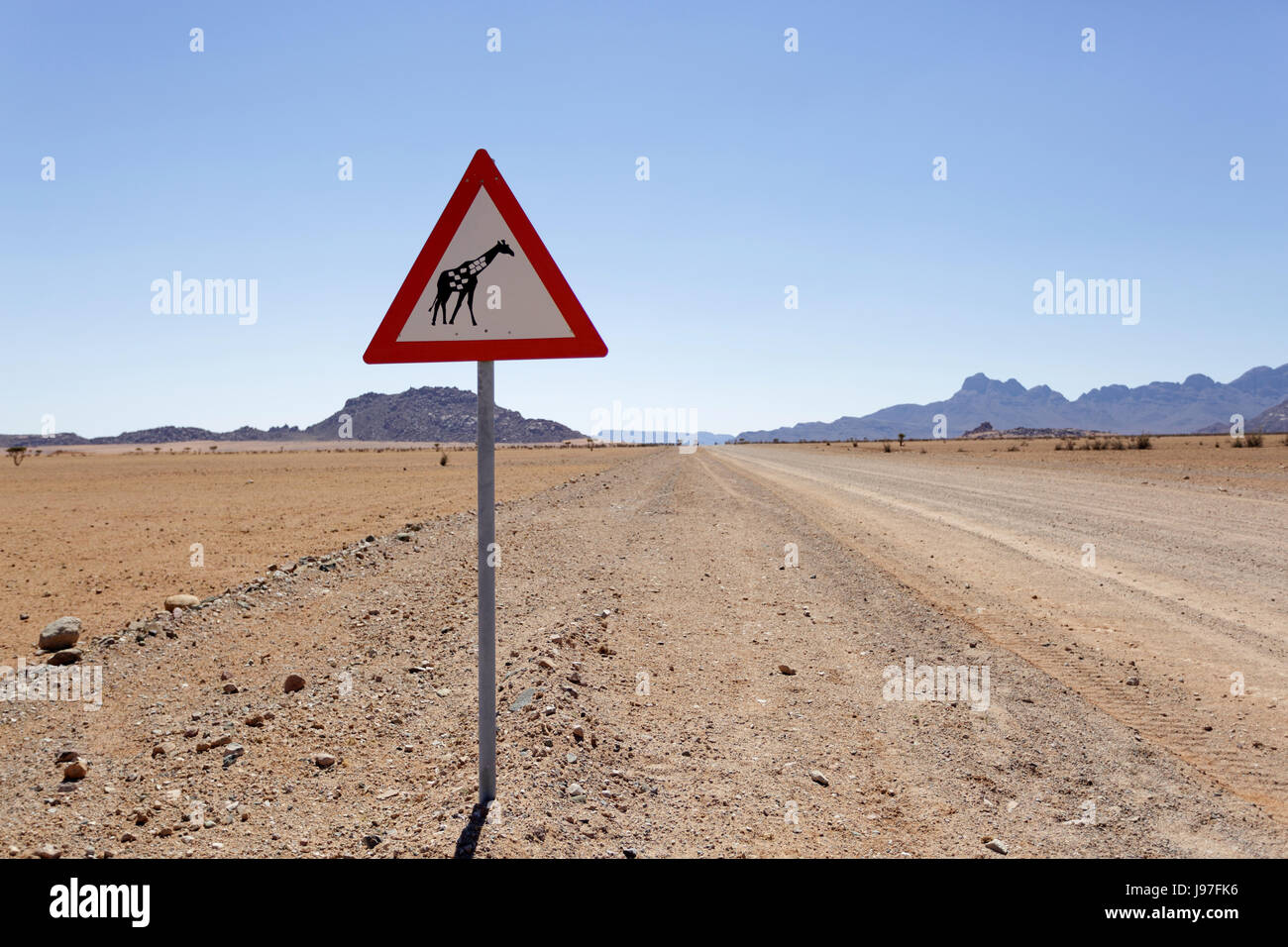 Giraffe crossing warning sign, Namibia Stock Photo - Alamy