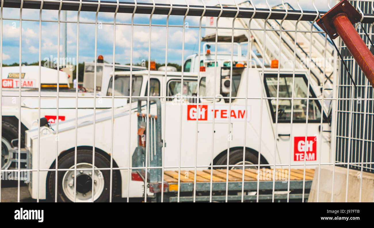 Nantes, FRANCE - April 27, 2017 ; Baggage tractors of the GH TEAM, an ...