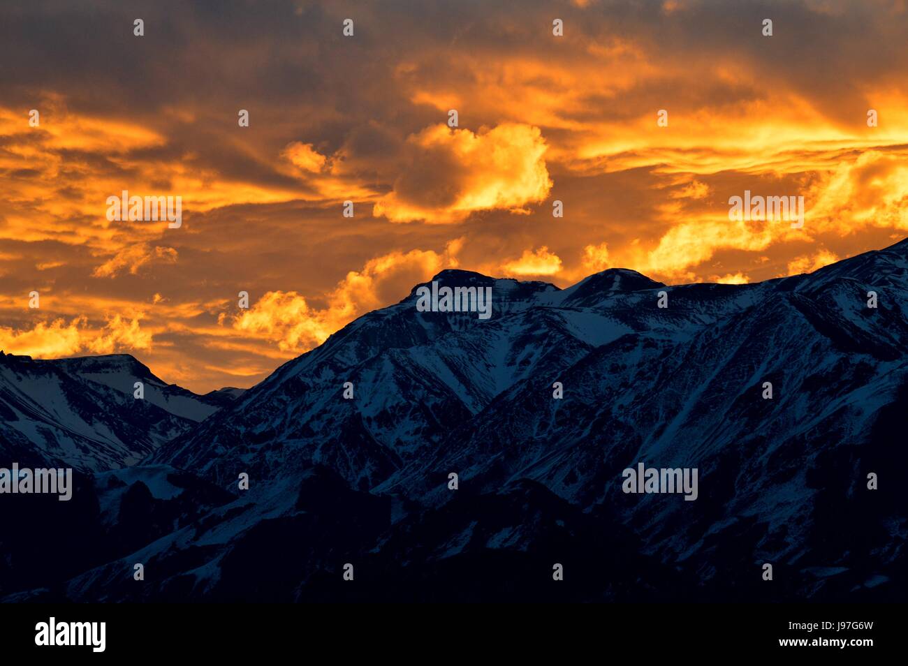 Imposing sunset behind the Andes mountain range in Mendoza, Argentina ...