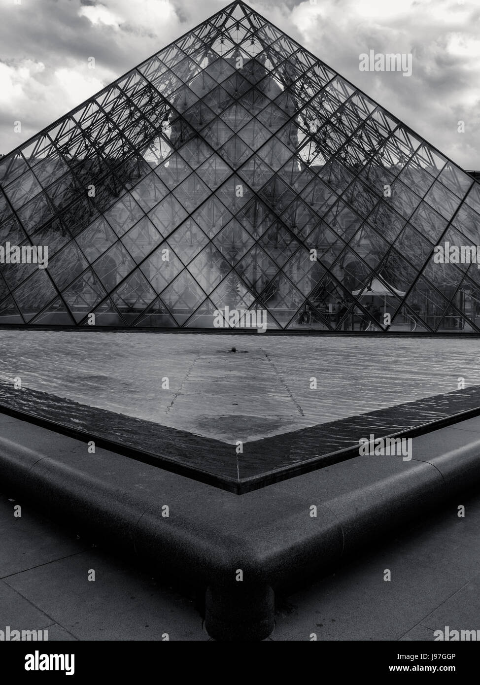 Louvre Museum from the front. View is through the Louvre Pyramid Stock ...