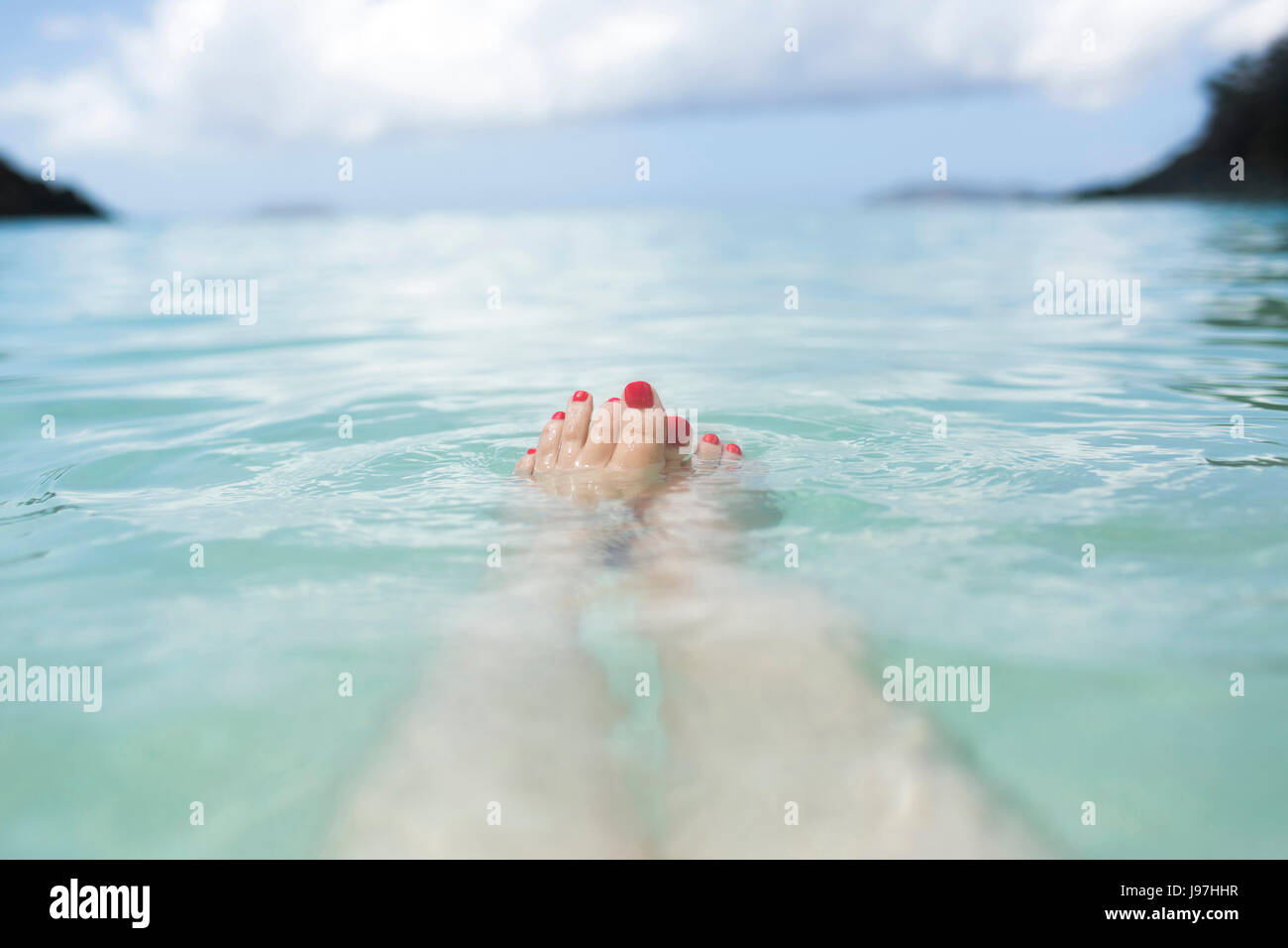Female feet in sea hi-res stock photography and images - Alamy