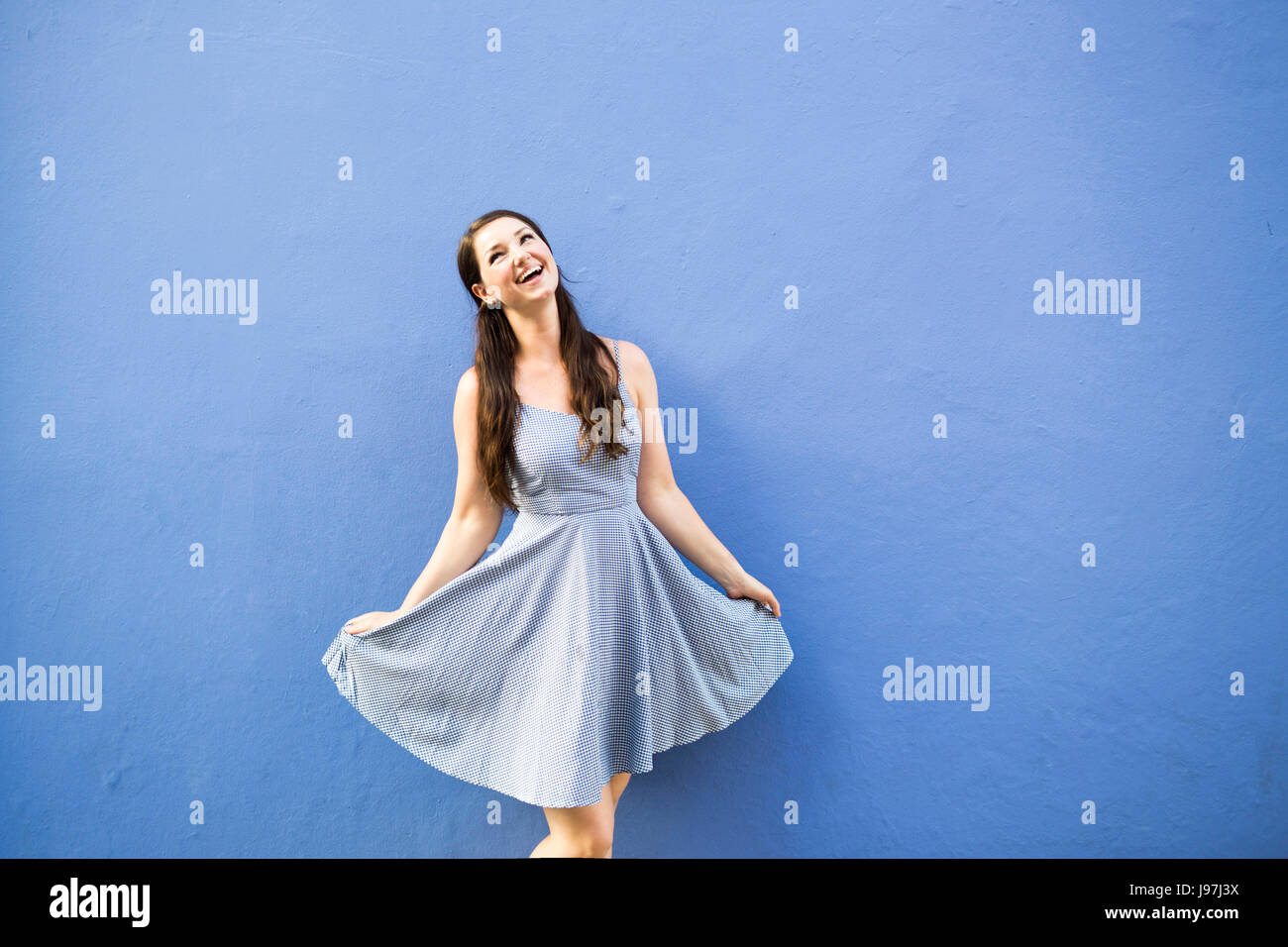 Beautiful happy woman dancing Stock Photo - Alamy
