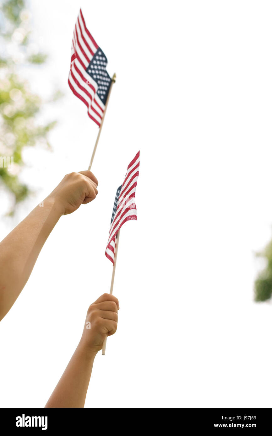 Boy and girl holding flags hi-res stock photography and images - Alamy