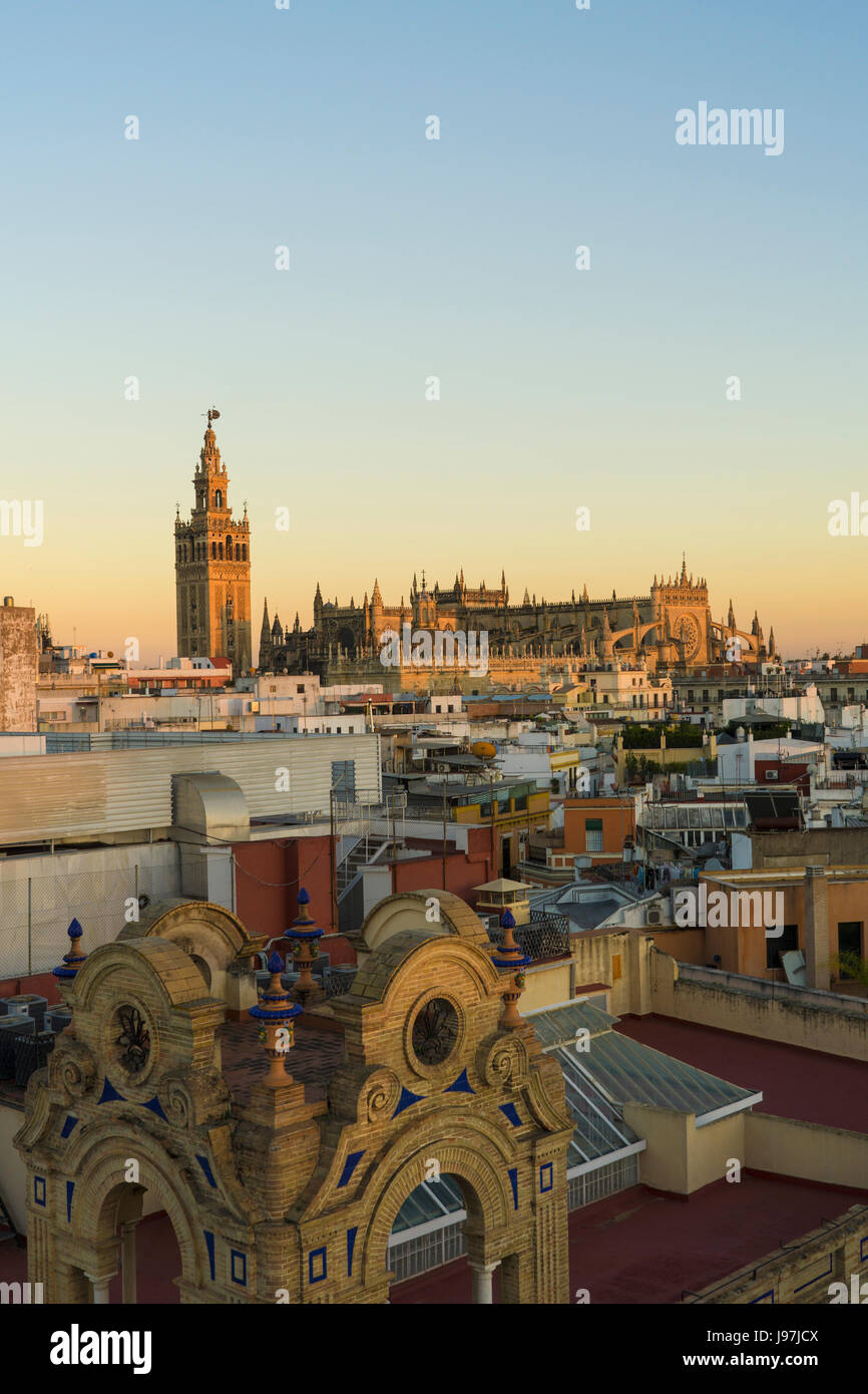 Spain, Seville, Cityscape with Cathedral of Seville at sunset Stock ...
