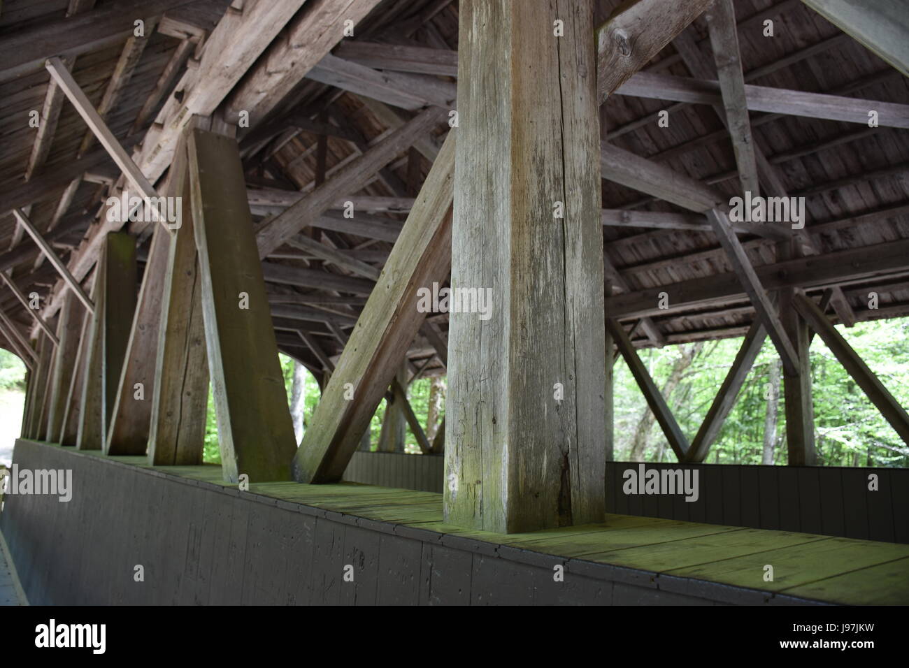 Covered bridge going over the Pemigewasset River at Flume Gorge Stock ...