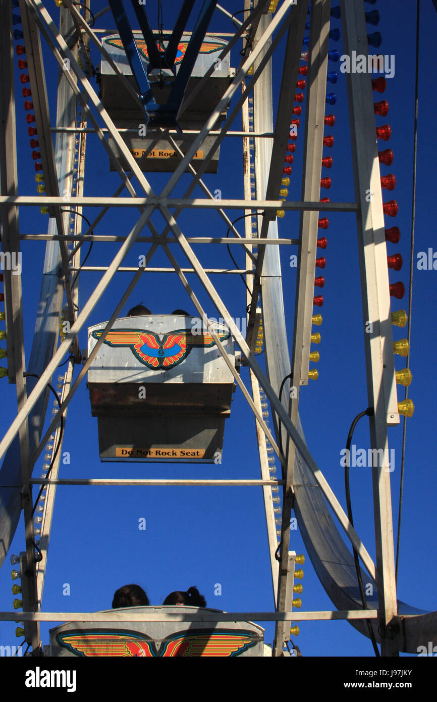 Ferris wheel ride in amusement park Stock Photo - Alamy