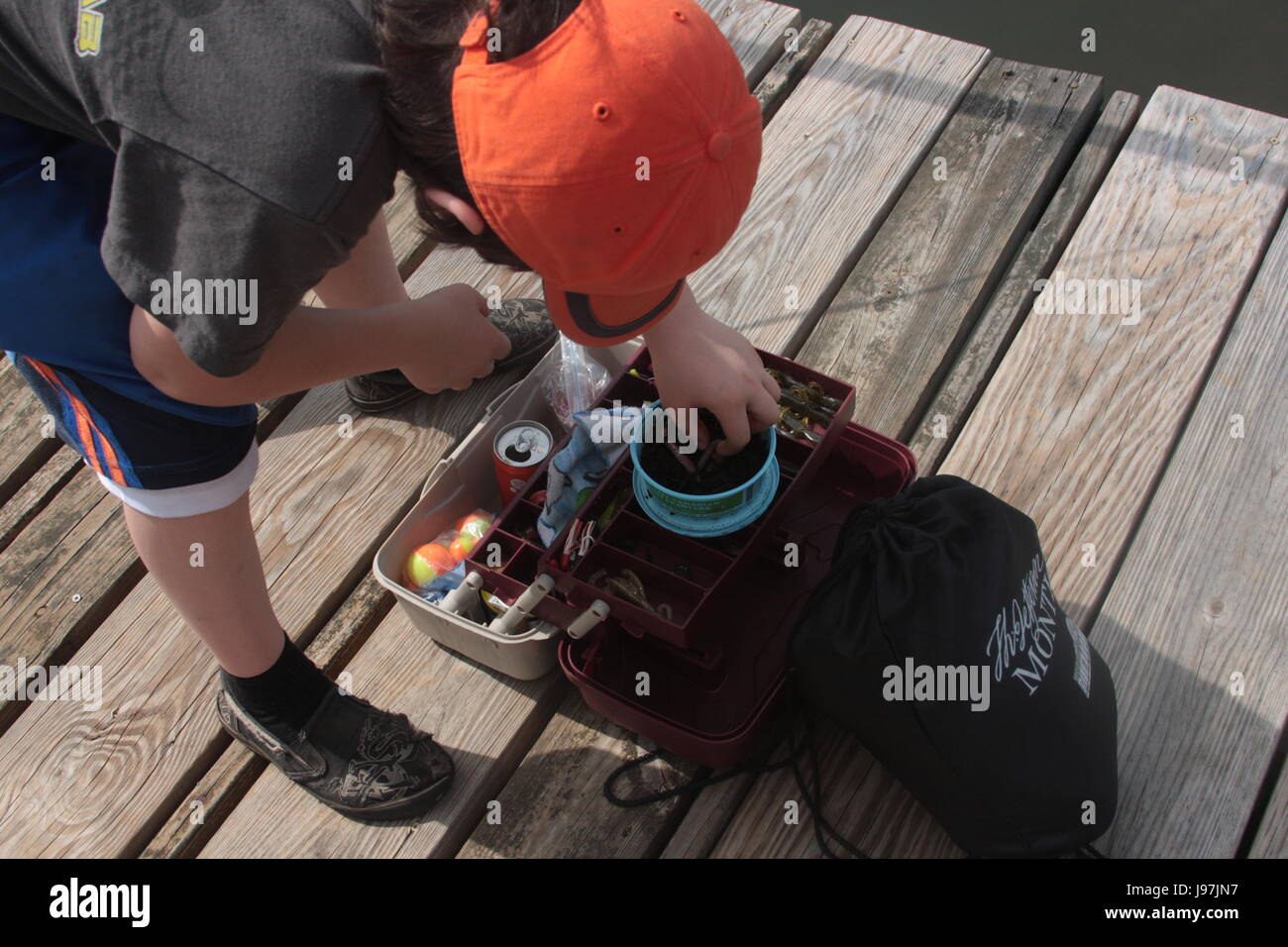 Fisherman preparing bait hi-res stock photography and images - Alamy