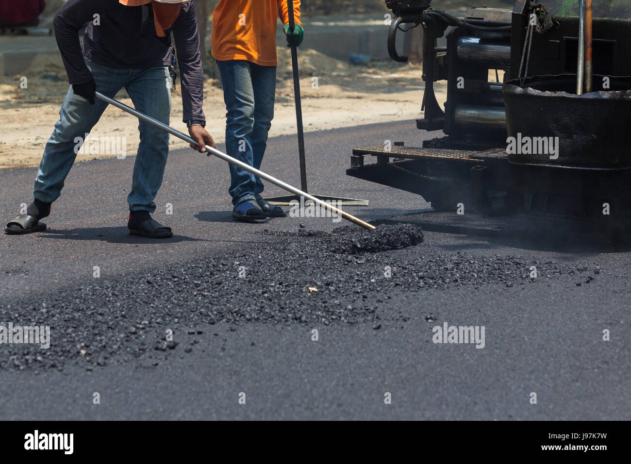 Worker working in roadwork site Stock Photo - Alamy