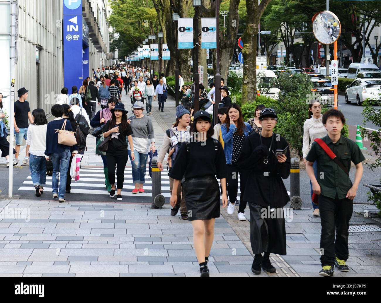 The modern Ometosando boulevard in Tokyo has many fashionable shops and ...