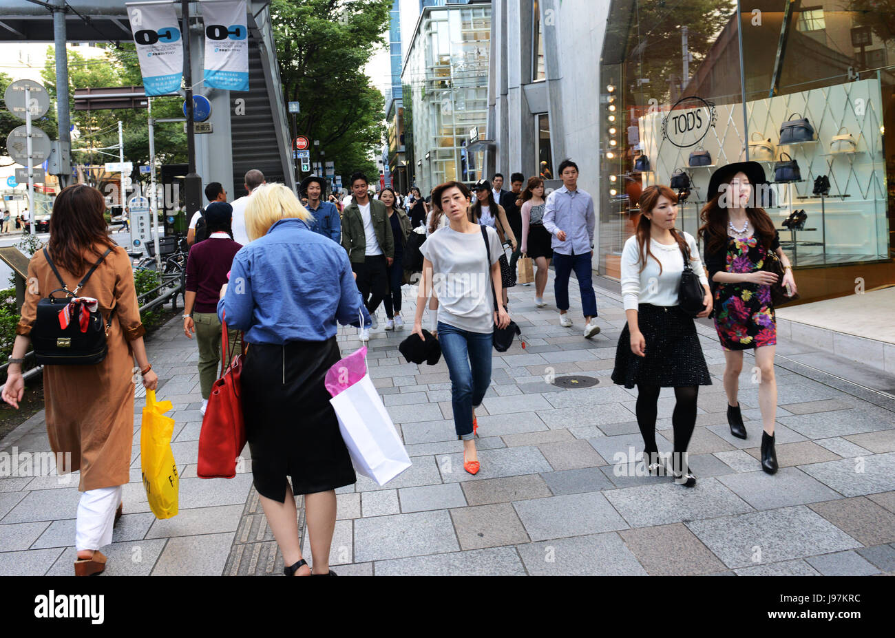 The modern Ometosando boulevard in Tokyo has many fashionable shops and ...