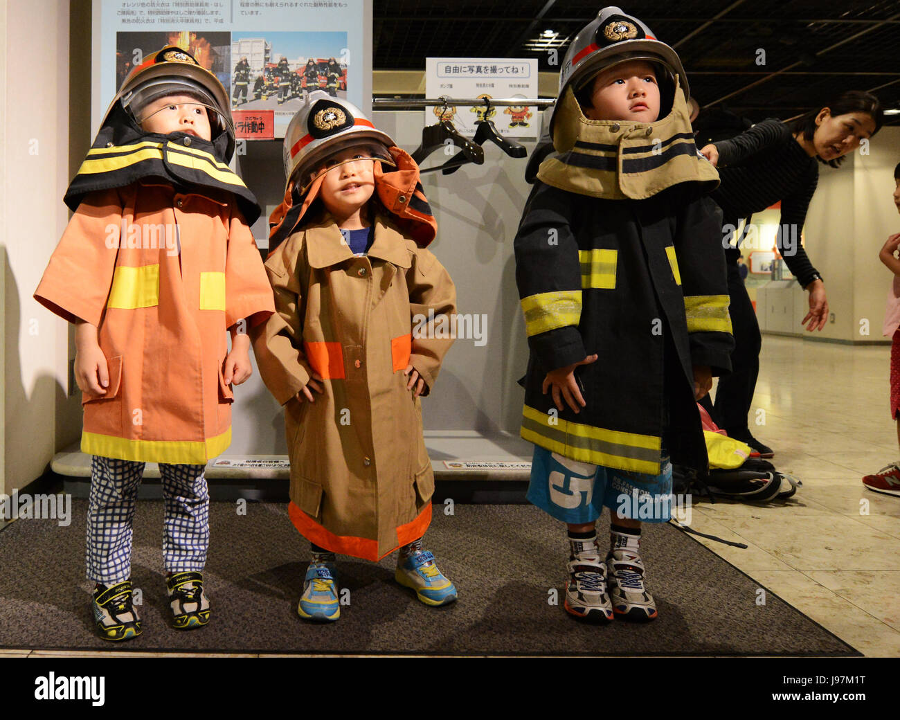 Japanese children dressed as firefighters in Tokyo's fire museum in ...