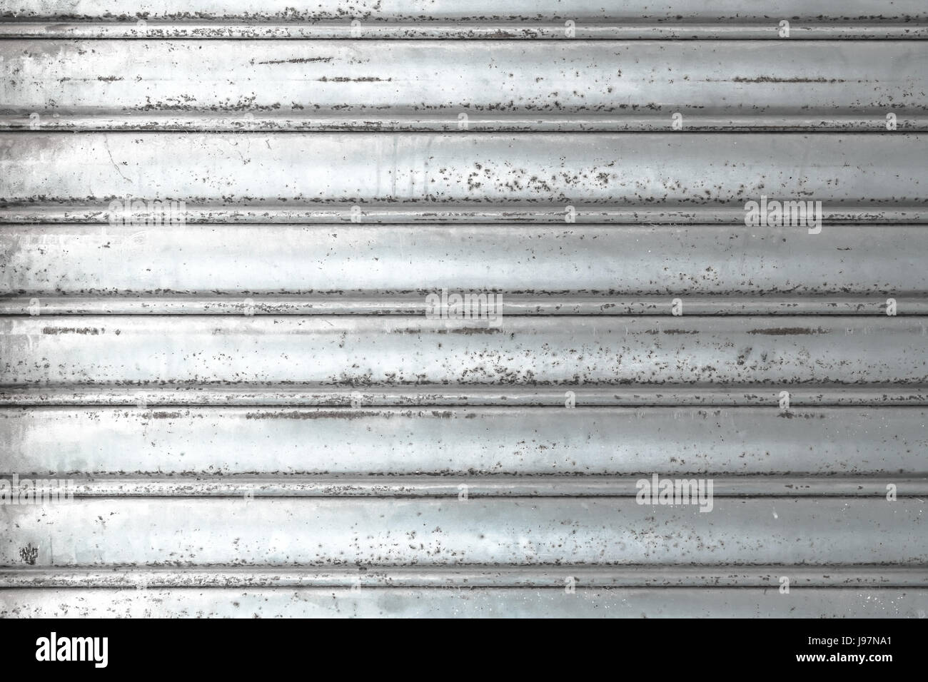 Grungy light metal window roller blinds background Stock Photo - Alamy