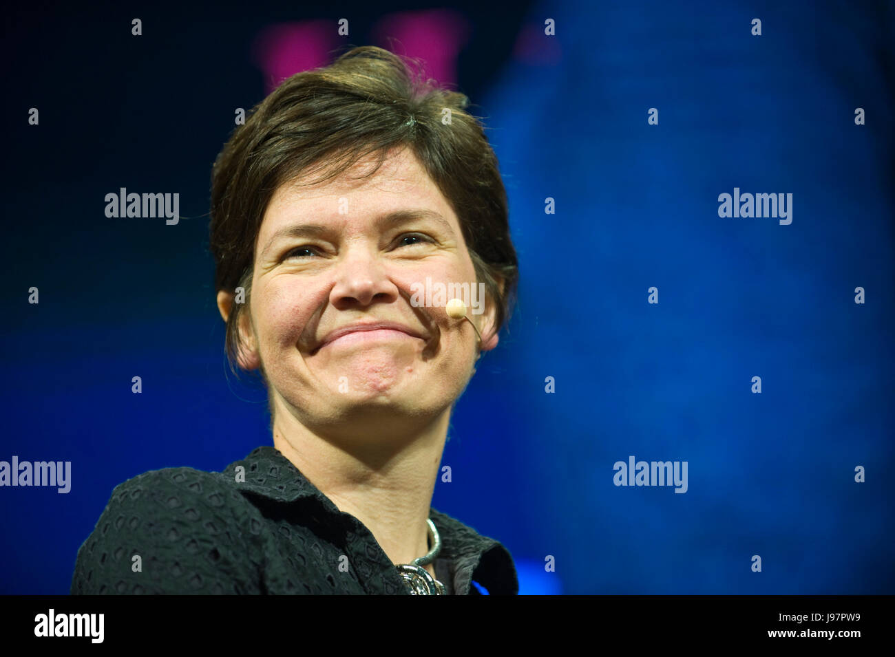 Economist Kate Raworth author of Doughnut Economics speaking on stage ...