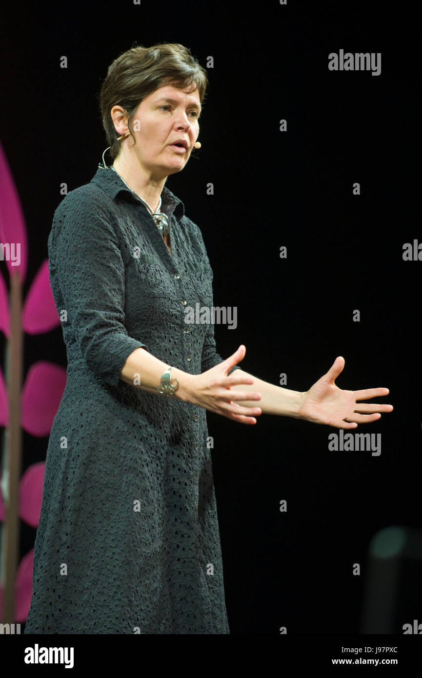 Economist Kate Raworth author of Doughnut Economics speaking on stage ...