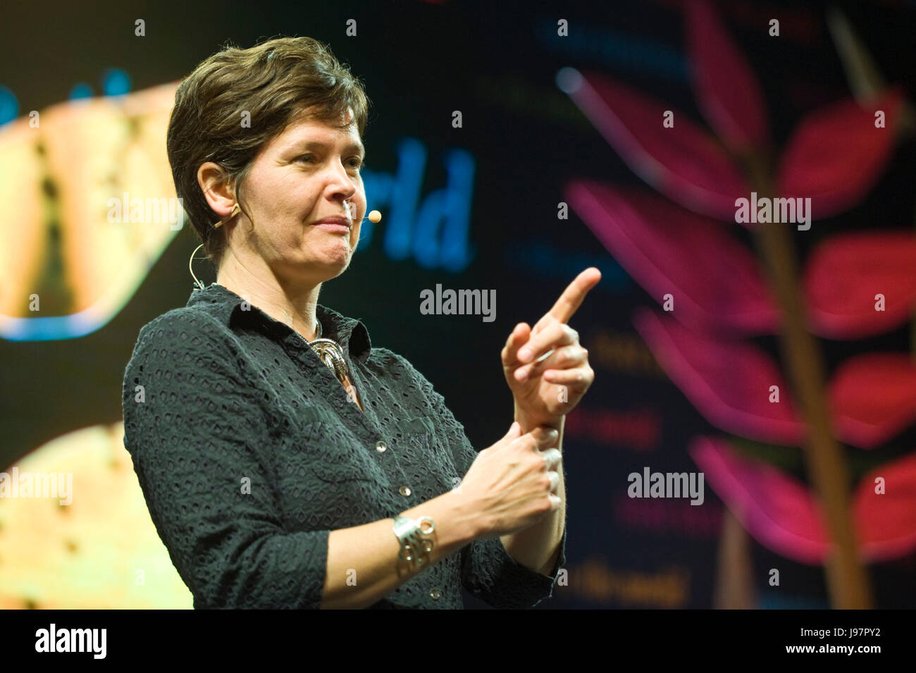 Economist Kate Raworth author of Doughnut Economics speaking on stage ...