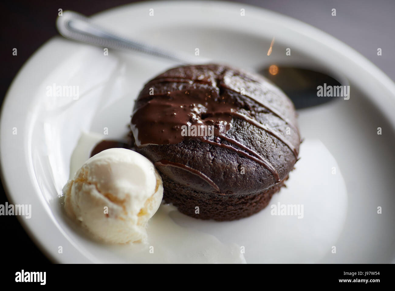Traditional British chocolate cake with ice-cream Stock Photo - Alamy