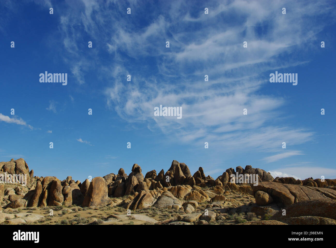 alabama hills rocks under beautiful clouds and blue sky,california ...