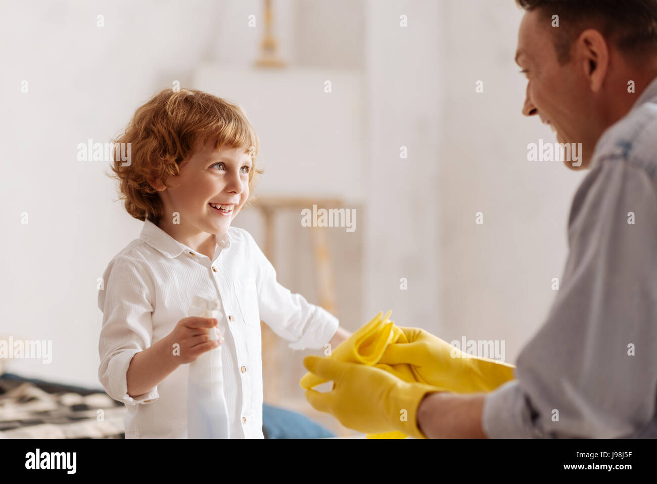 Portrait of handsome kid while joking with father Stock Photo - Alamy