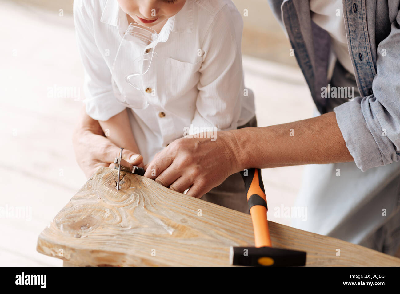 Close up photo of male hands while making bench Stock Photo - Alamy