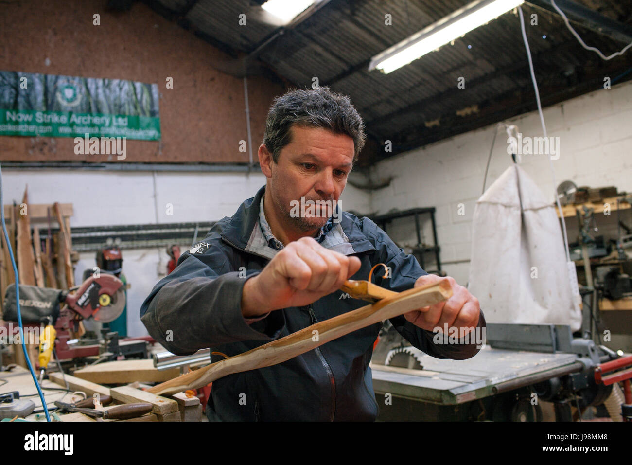 Rob makes fine adjustments to the bow before shaping the nocks which ...
