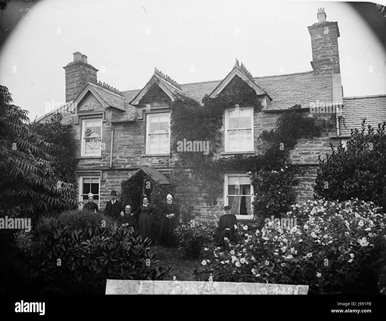 Rowlands family and their house NLW3361962 Stock Photo - Alamy