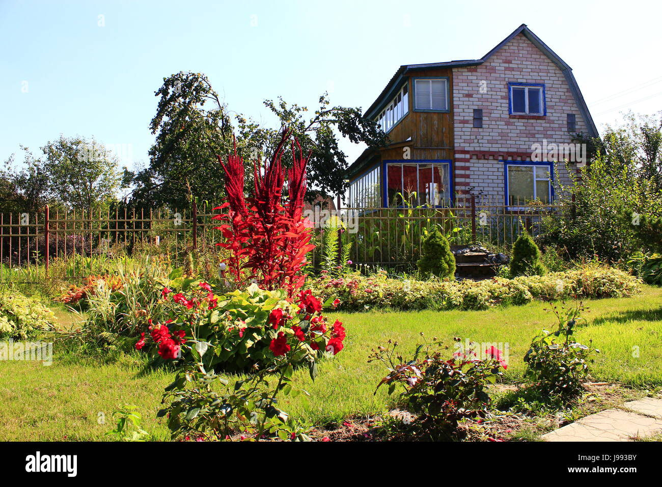 beautiful view to country house with green lawn Stock Photo - Alamy