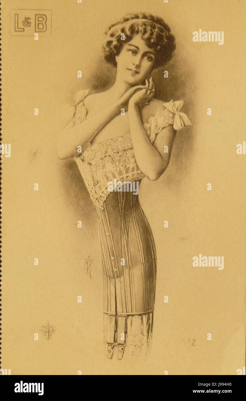 Postcard woman in corset Stock Photo - Alamy