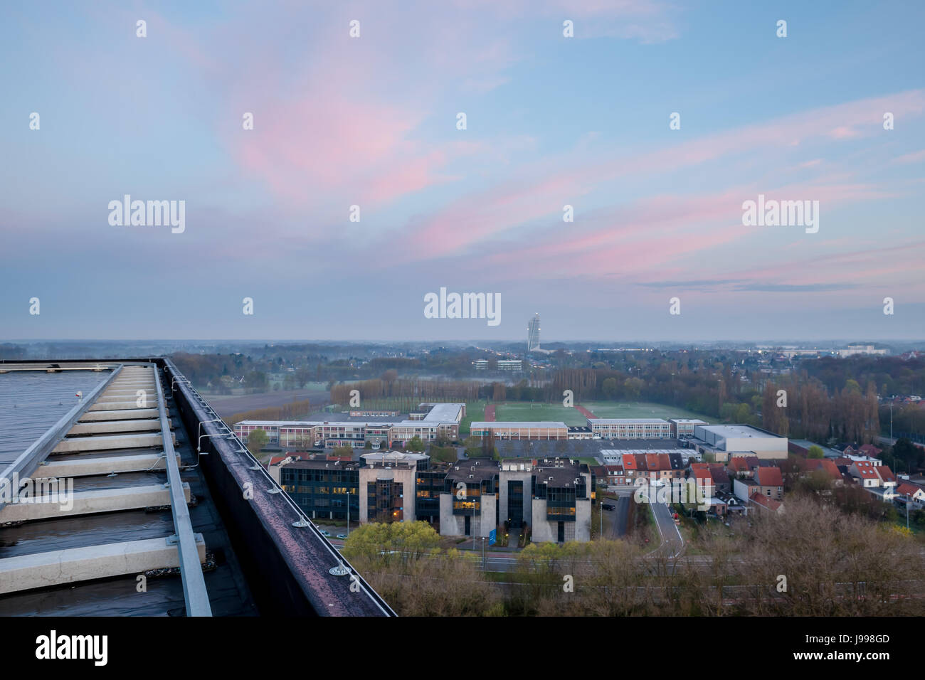 On the roof of a tall building you have a beautiful view with sunrise ...