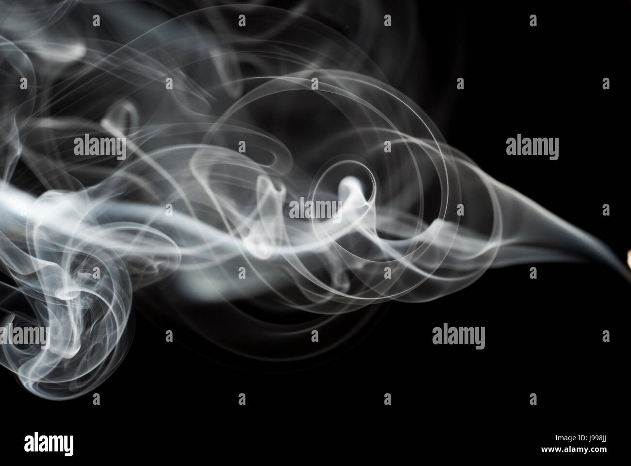 Figure smoking cigarette hi-res stock photography and images - Alamy