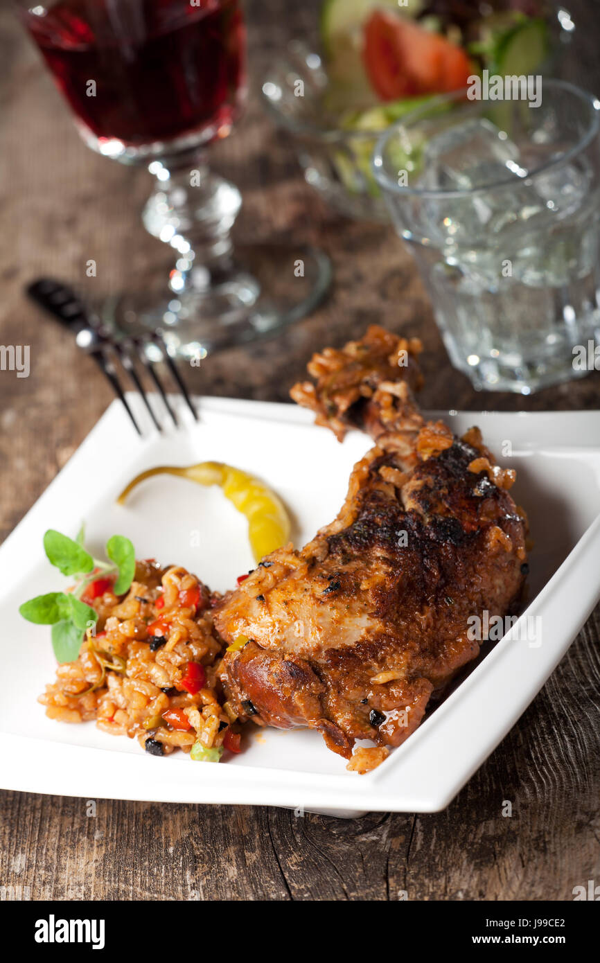grilled chicken leg on rice with chilli Stock Photo - Alamy