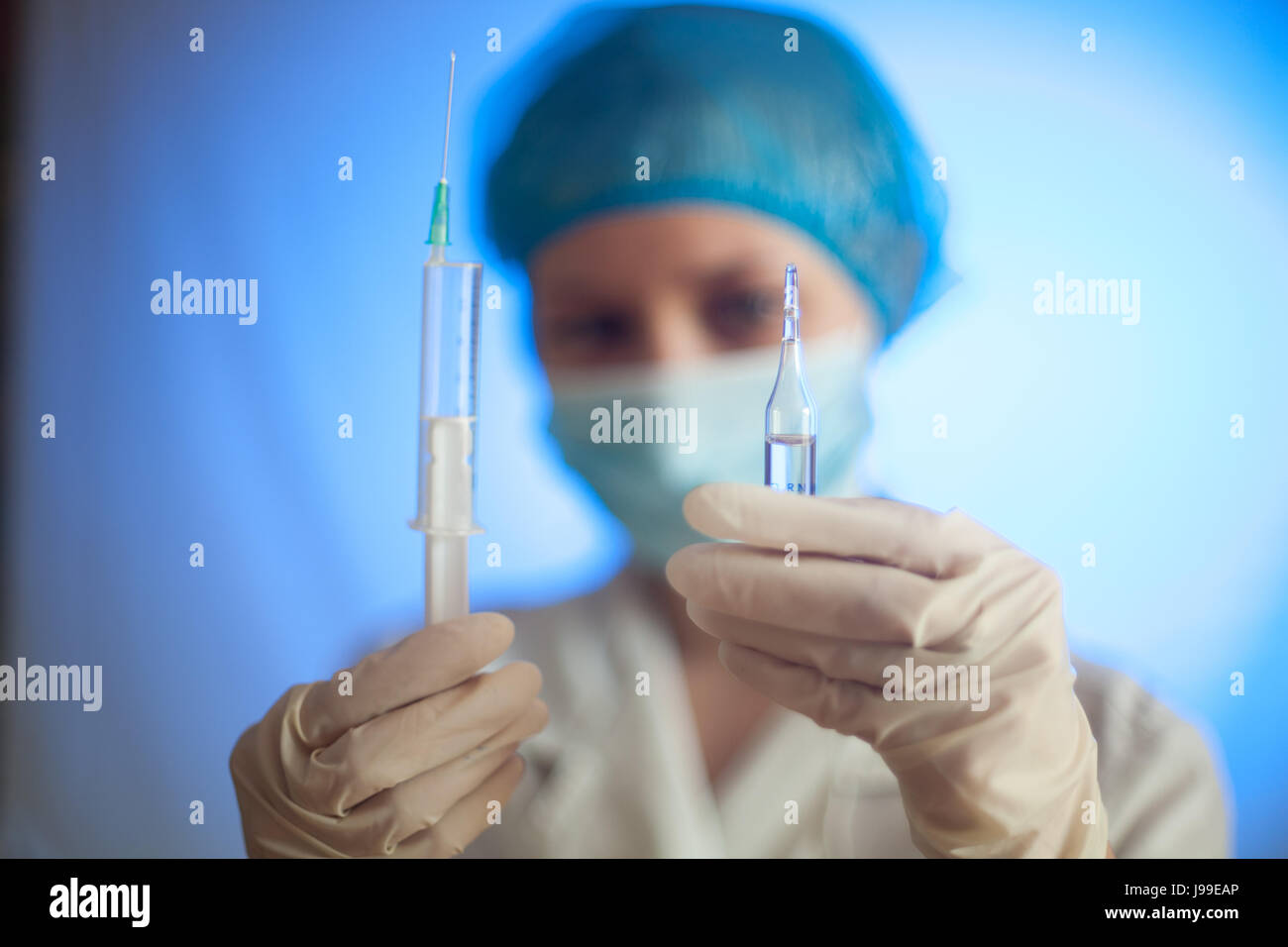 Syringe, medical injection in hand, palm or fingers. Medicine plastic ...
