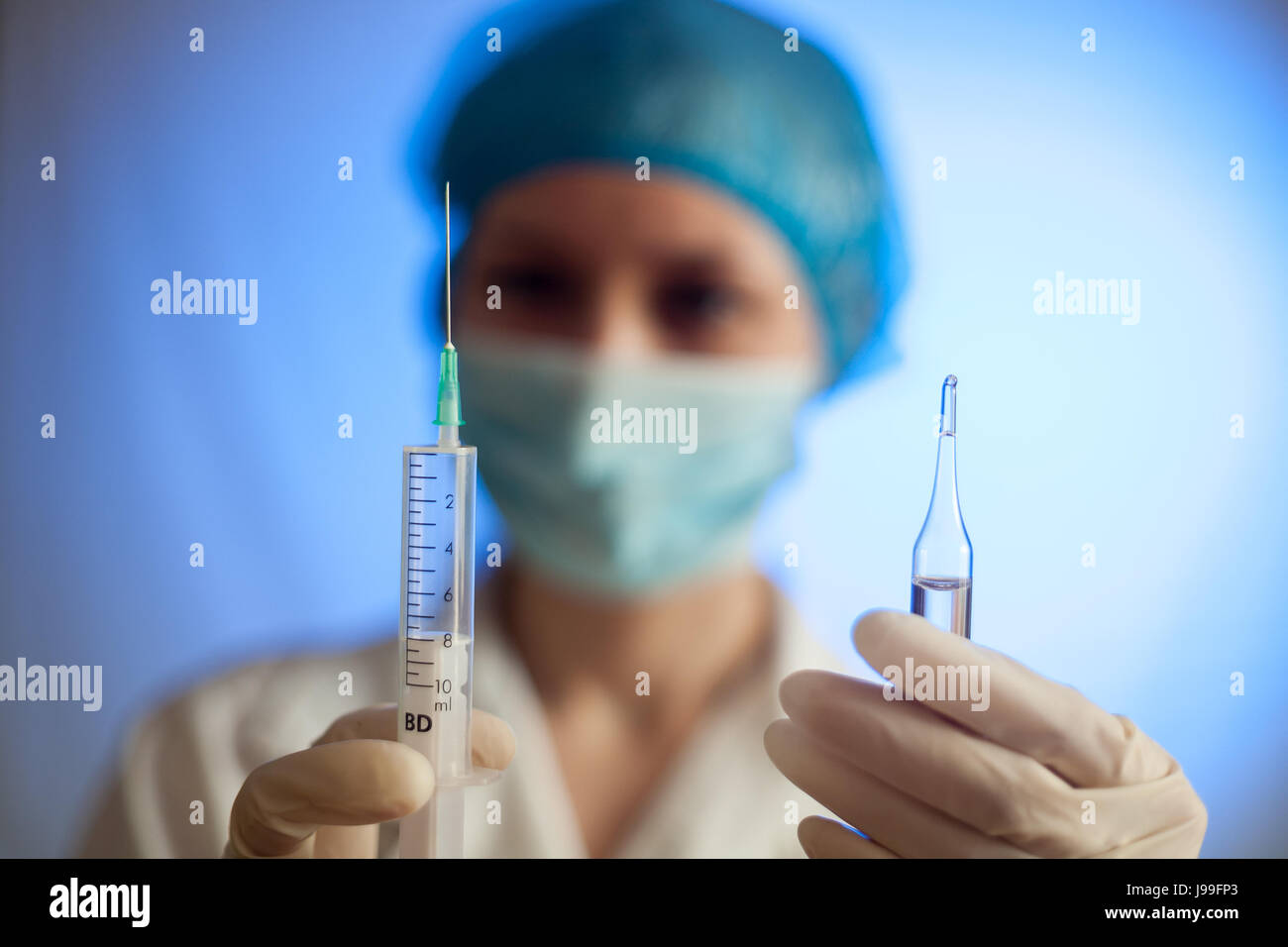 Syringe, medical injection in hand, palm or fingers. Medicine plastic ...