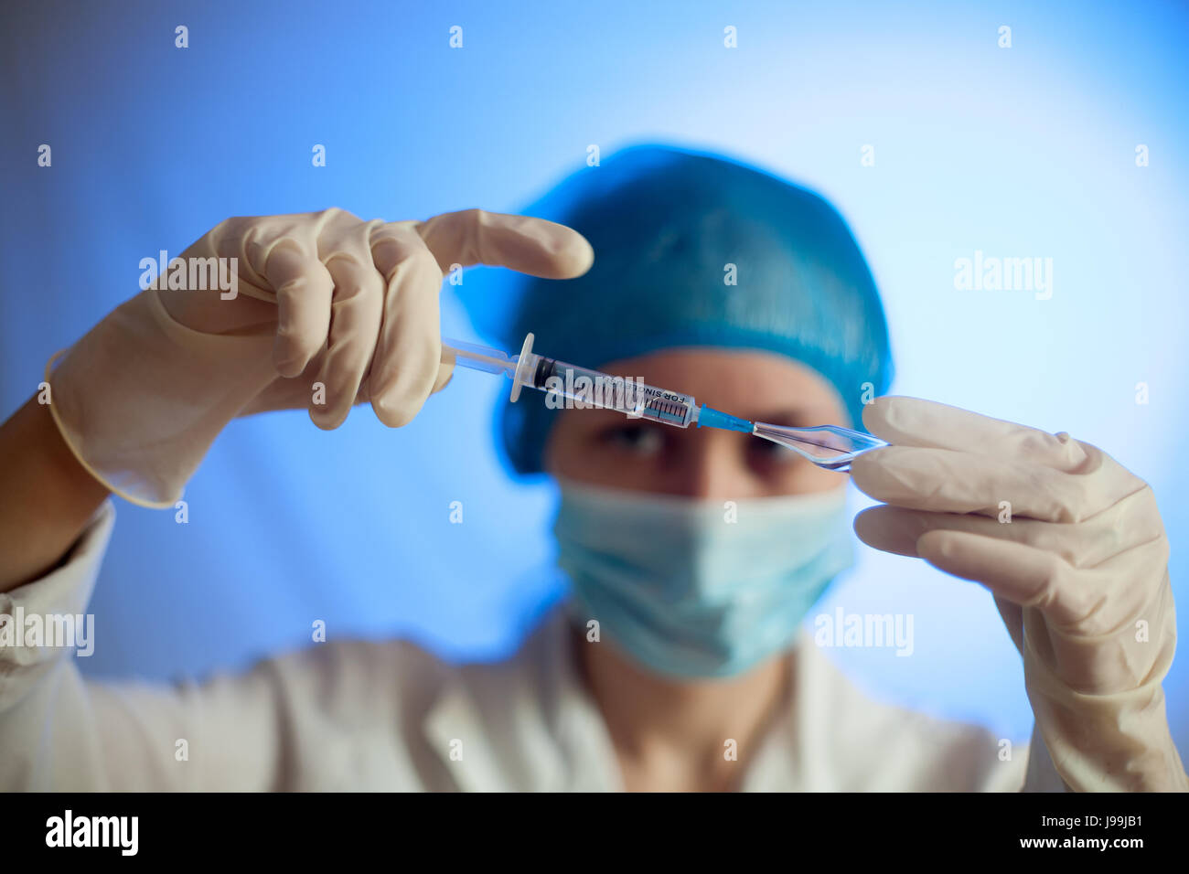 Syringe, medical injection in hand, palm or fingers. Medicine plastic ...