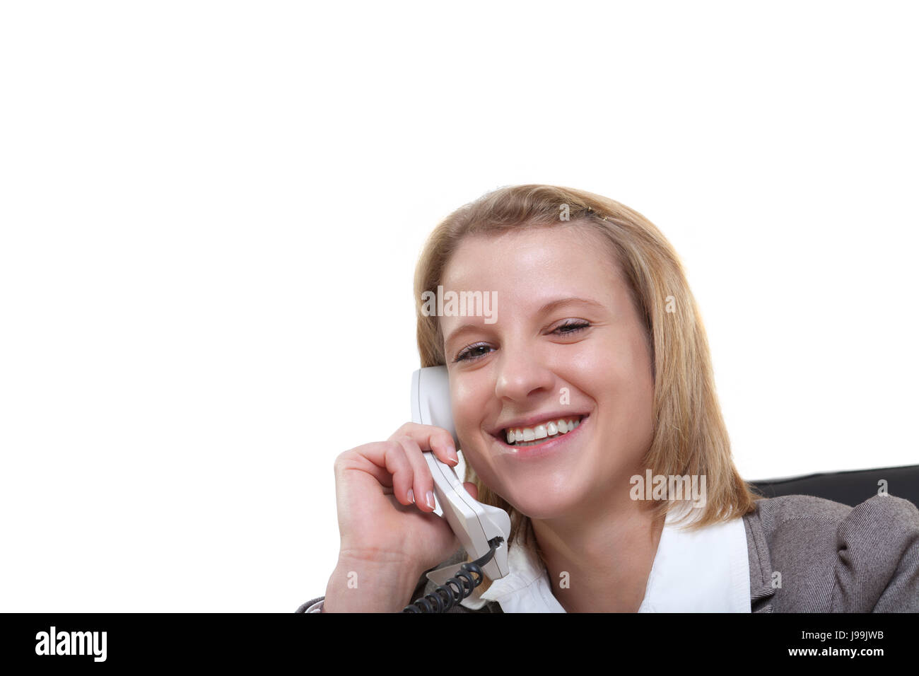 young woman smiling on the phone Stock Photo - Alamy