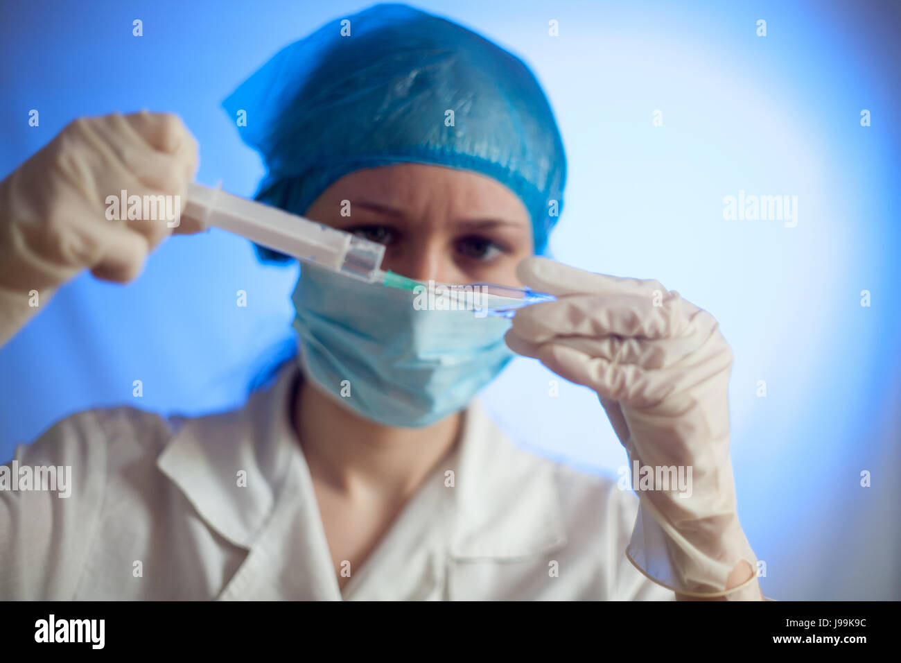 Syringe, medical injection in hand, palm or fingers. Medicine plastic ...