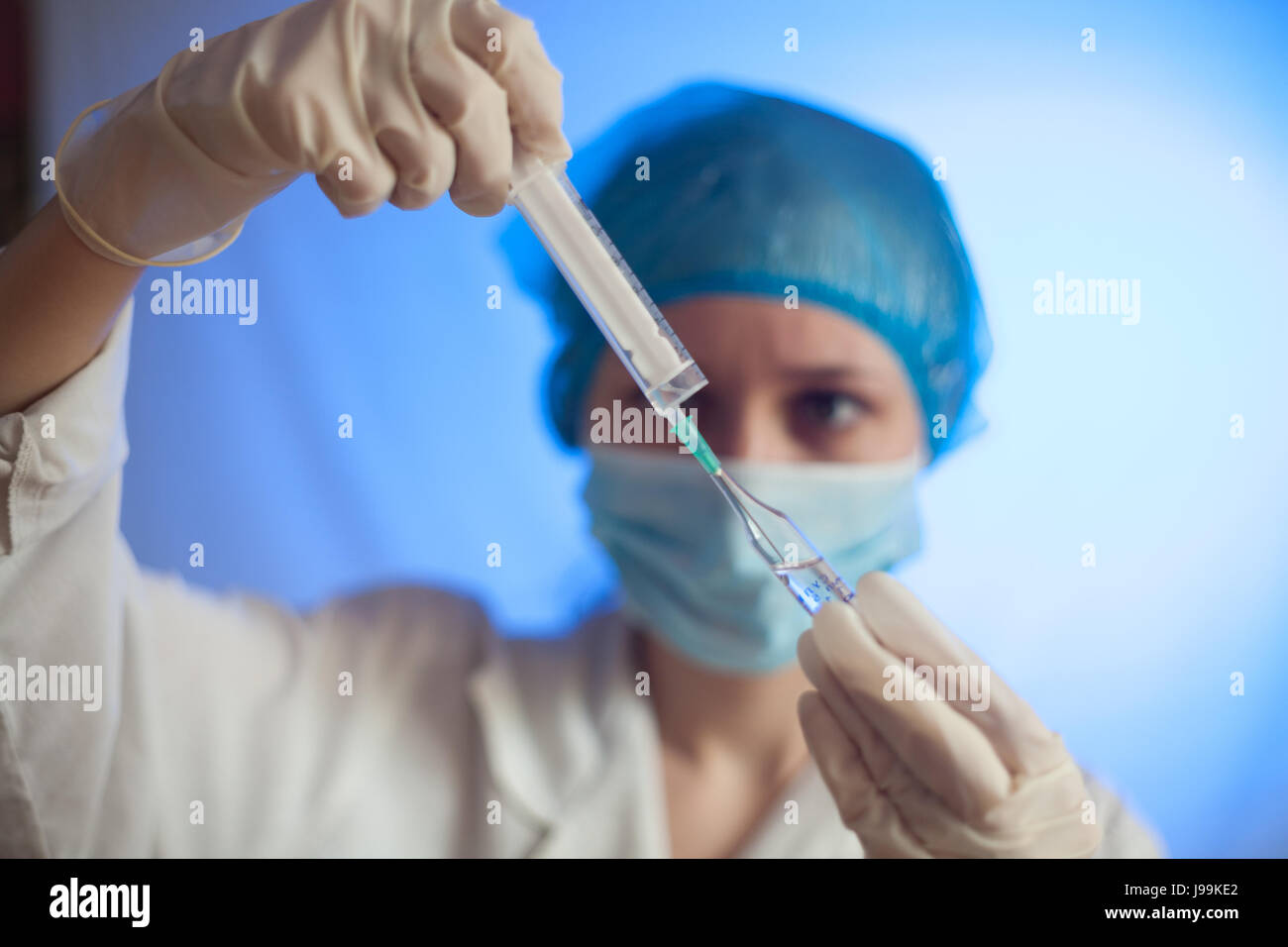 Syringe, medical injection in hand, palm or fingers. Medicine plastic ...