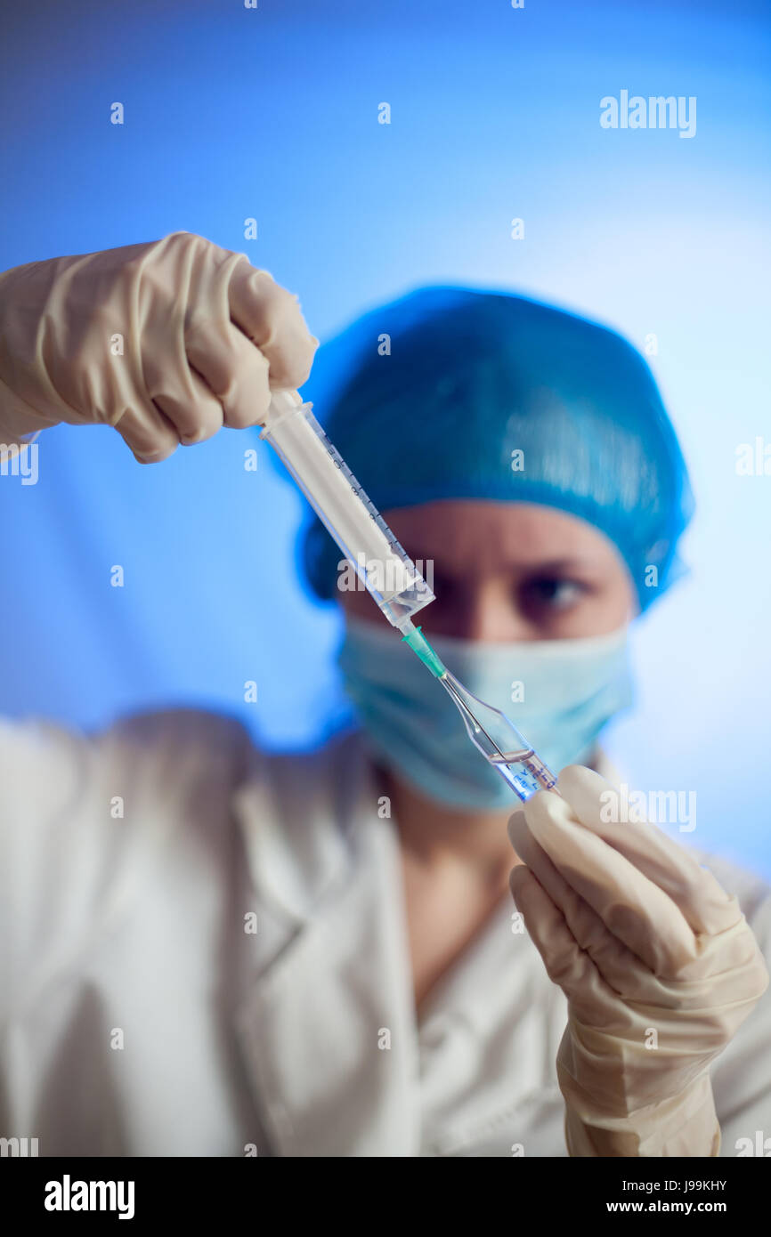 Syringe, medical injection in hand, palm or fingers. Medicine plastic ...
