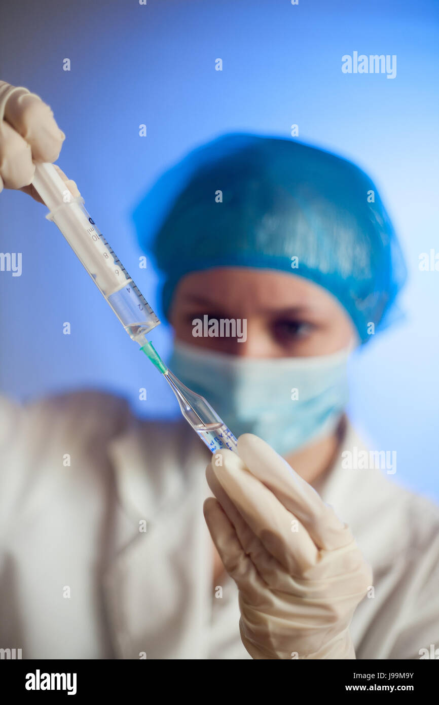 Syringe, medical injection in hand, palm or fingers. Medicine plastic ...