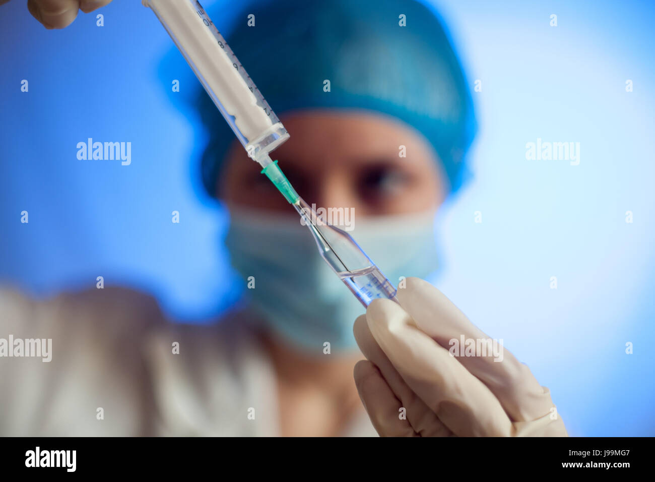 Syringe, medical injection in hand, palm or fingers. Medicine plastic ...