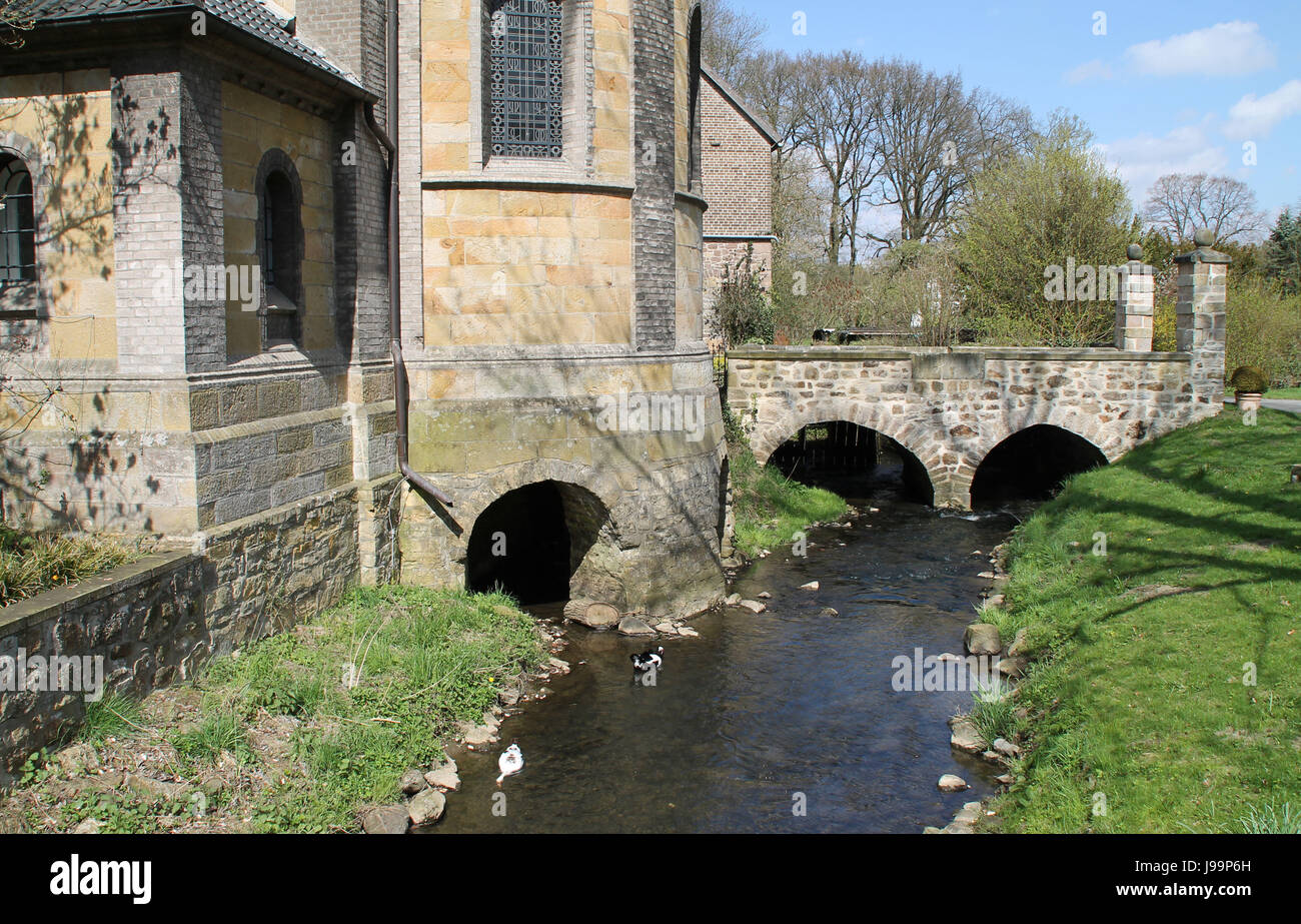 a creek behind a church Stock Photo - Alamy