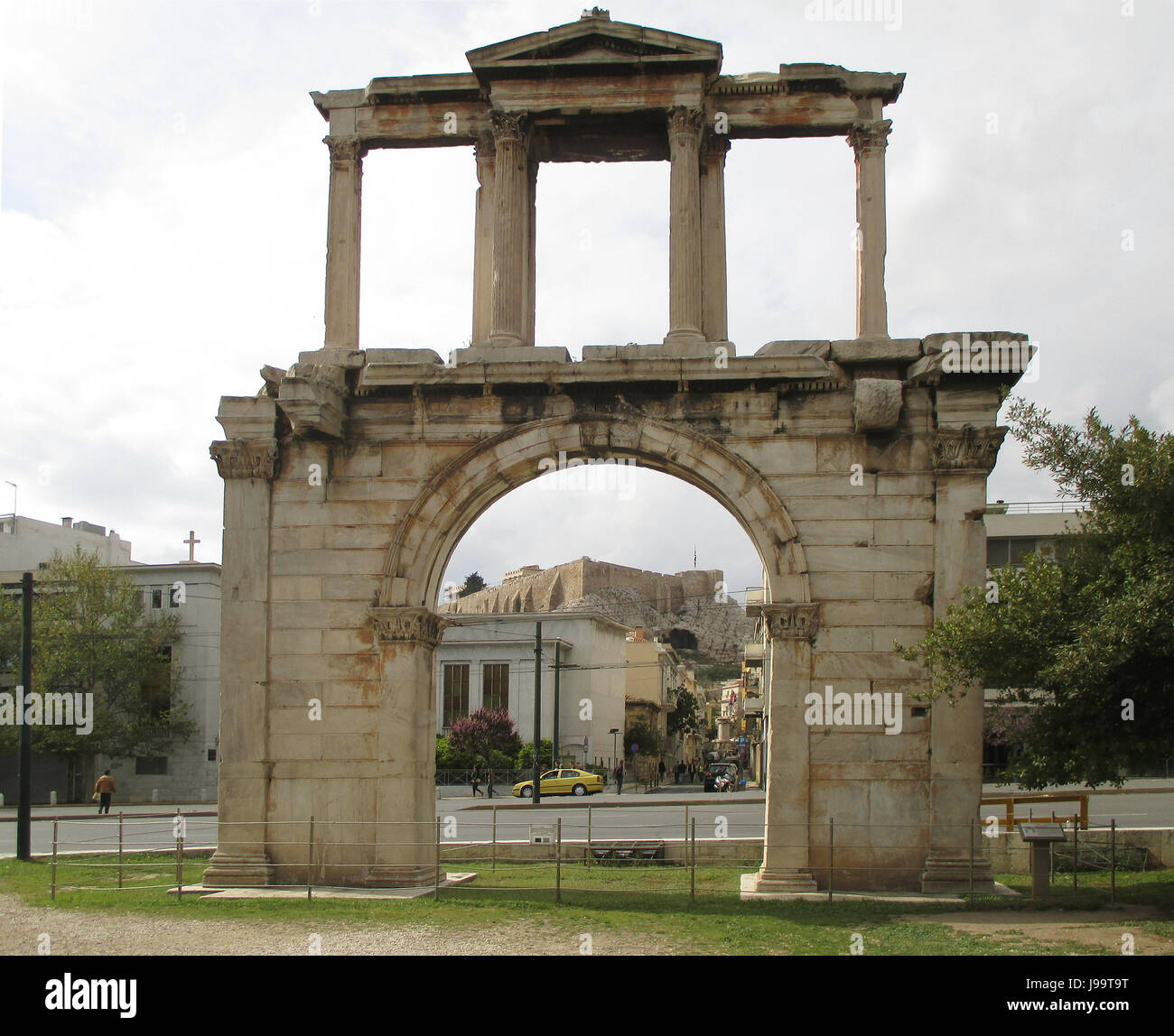 The Arch of Hadrian or Hadrian Gate with the Acropolis of Athens in the ...