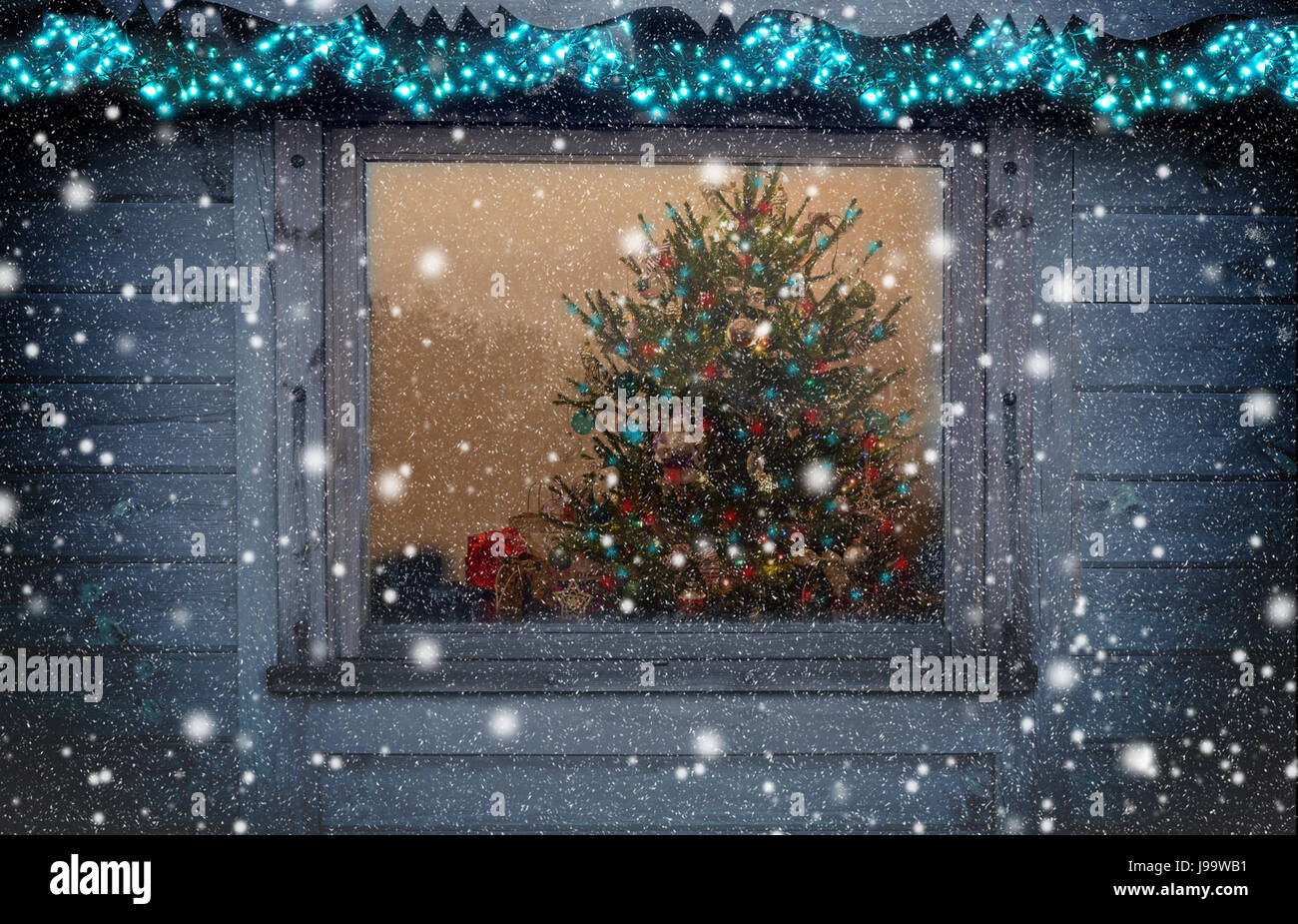 Christmas tree outside the window Stock Photo - Alamy
