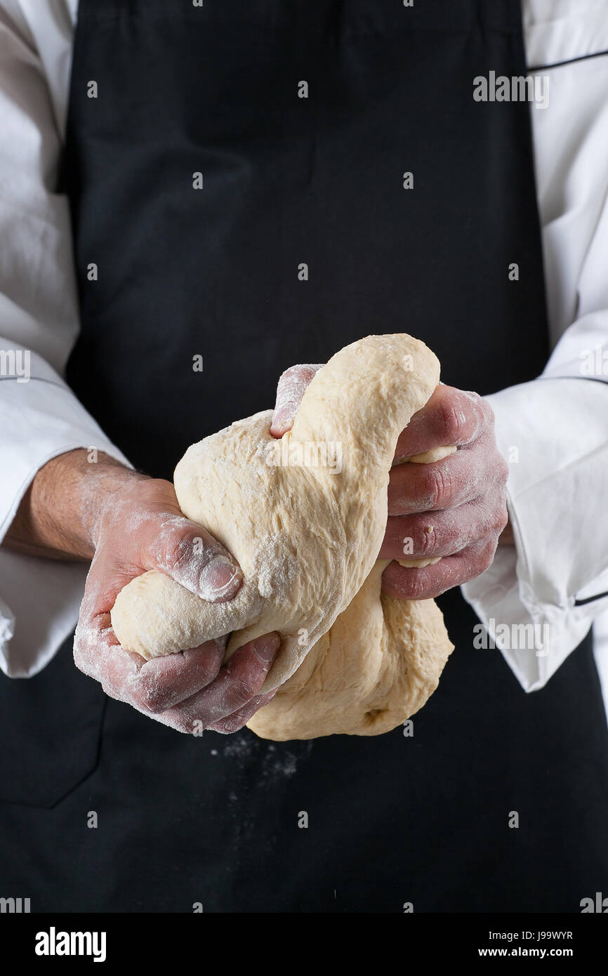 Chef kneading dough, Making dough by male hands at bakery Stock Photo ...