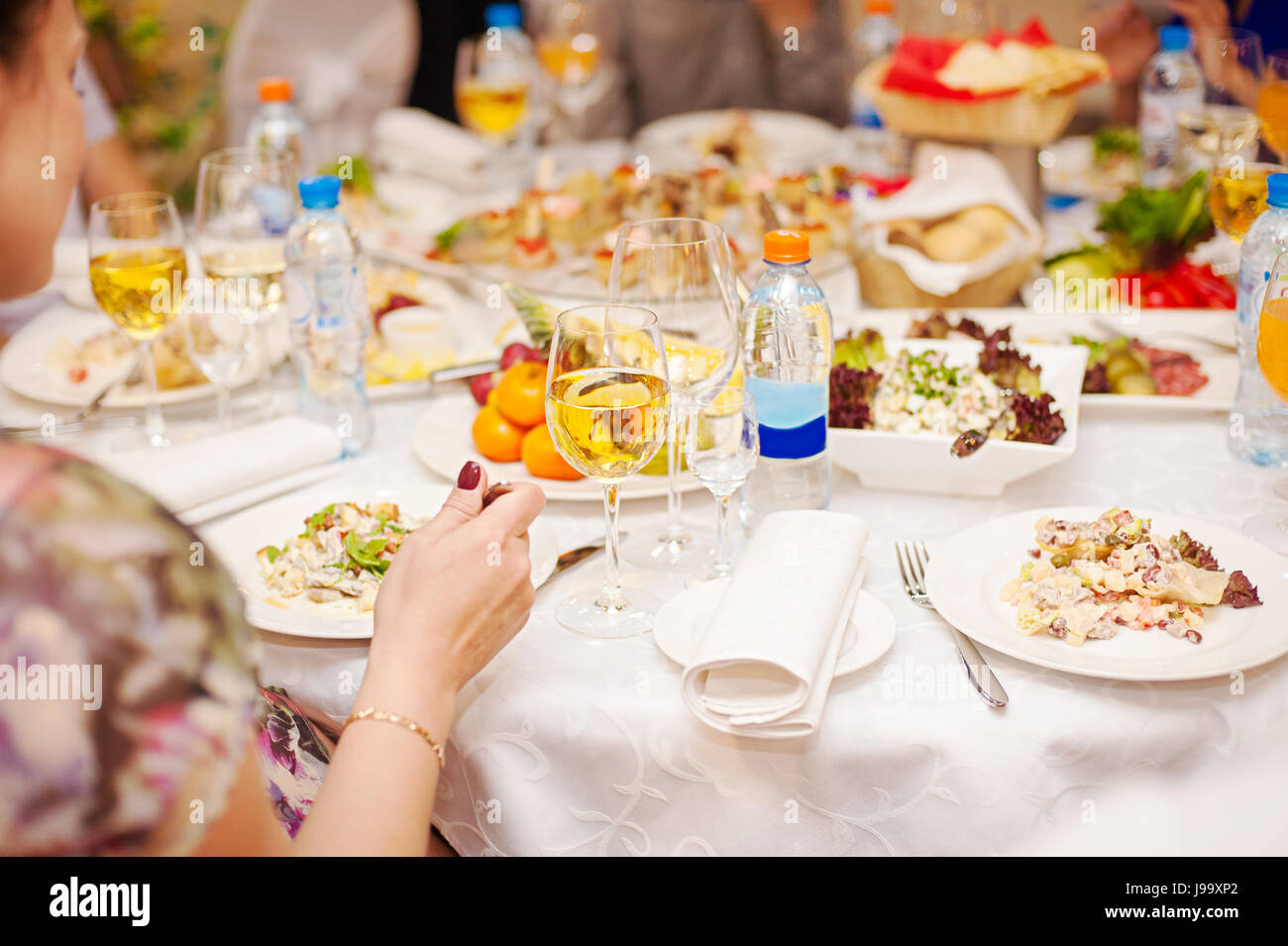 Female hand with a dinner Stock Photo - Alamy