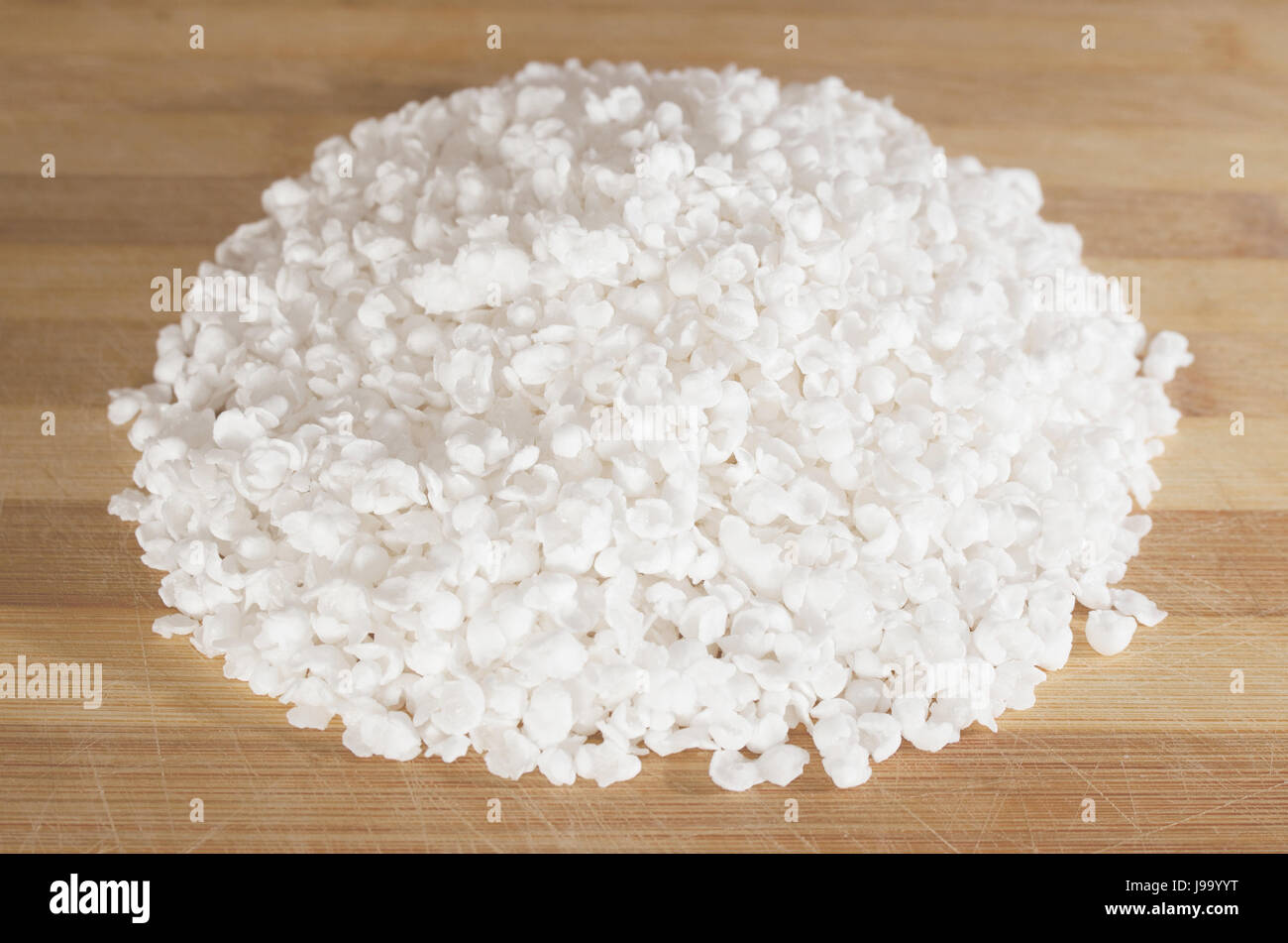 Tapioca flakes. Tapioca is a typical food from Brazil made of starch of ...